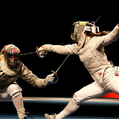 How many referees rule an official fencing match? | globalquiz.org